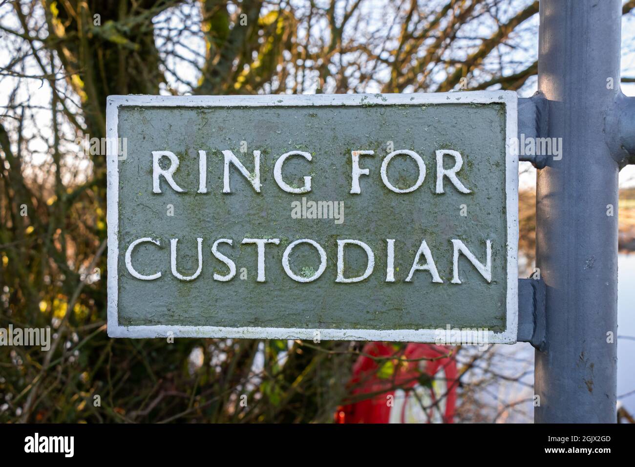 Ring for the custodian sign at the Threave Castle ferry crossing on the ...