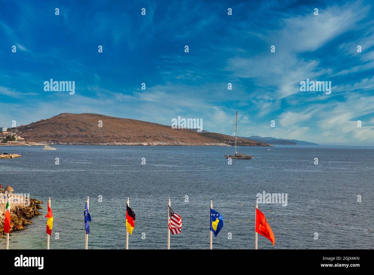 View over Saranda bay with national flags, Albania Stock Photo - Alamy