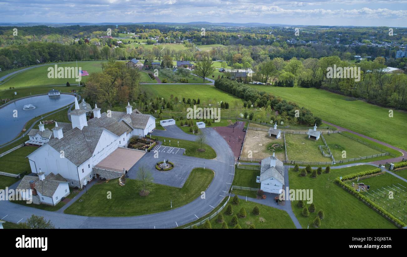 An aerial view of restored barn, buildings, and beautiful landscape ...