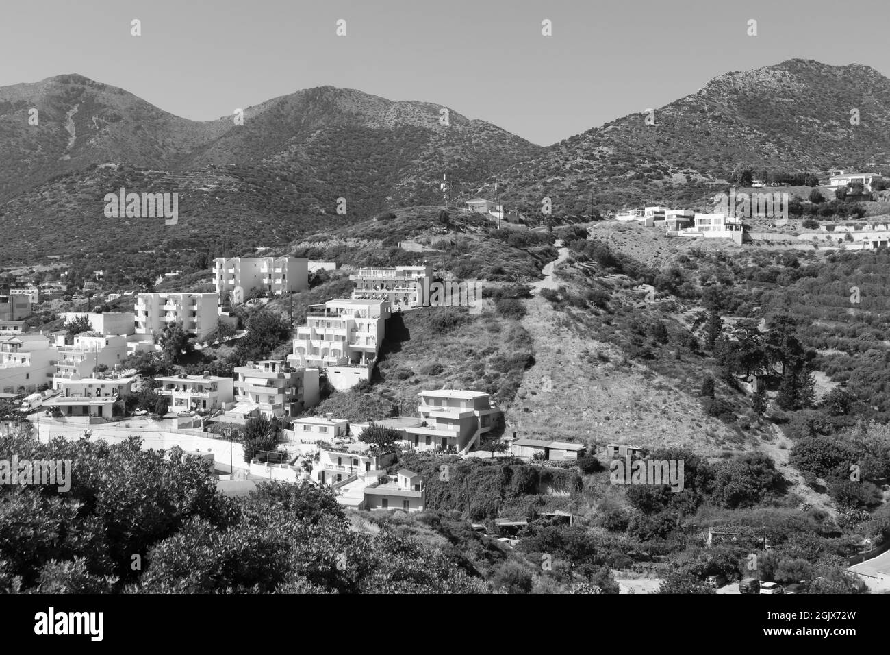A resort town on the mountains in Crete, Greece Stock Photo - Alamy