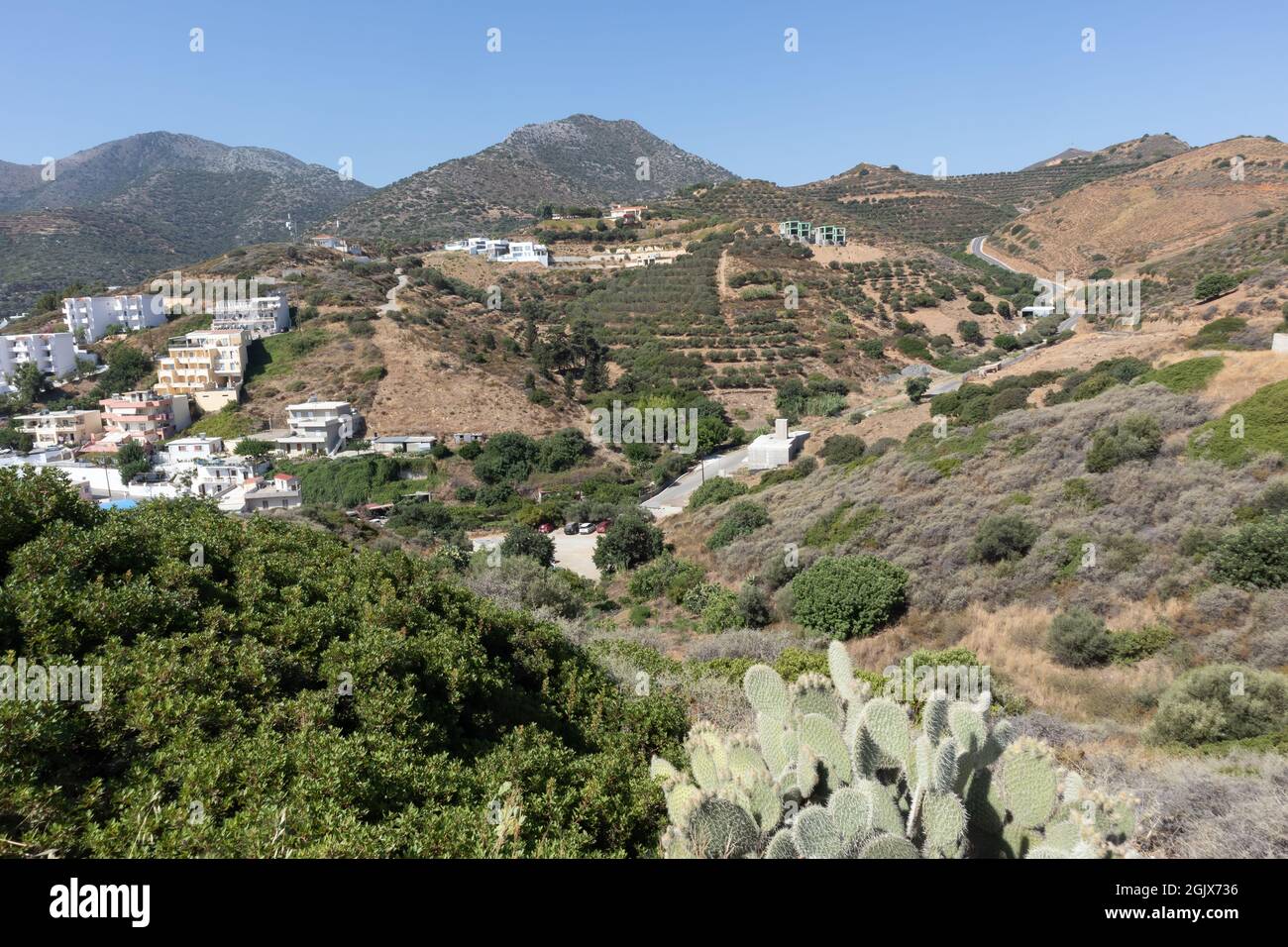 A resort town on the mountains in Crete, Greece Stock Photo - Alamy