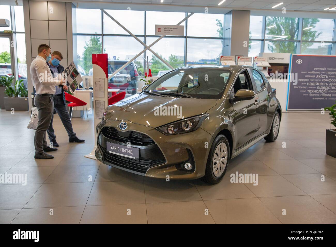 KYIV, UKRAINE - MAY 15, 2021: People visit new Toyota Yaris Hybrid car ...
