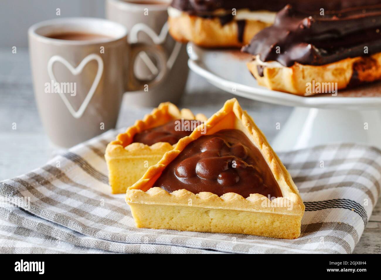 Chocolate triangles cookies. Party dessert Stock Photo - Alamy
