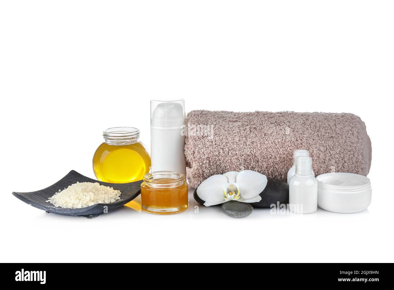 Spa setting with honey and nutrient cosmetic on white background Stock ...