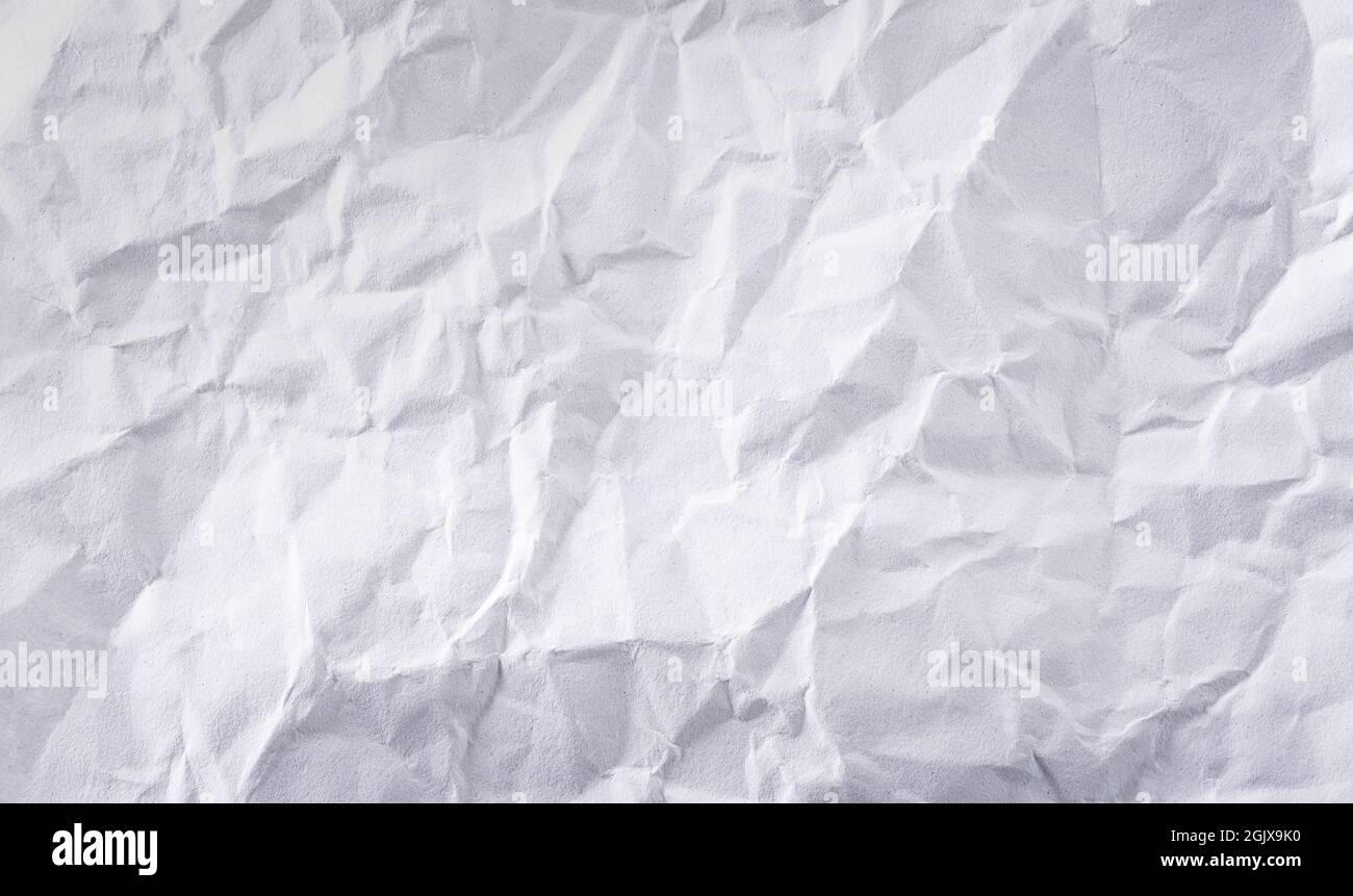 Close-up white crumpled paper texture background Stock Photo - Alamy