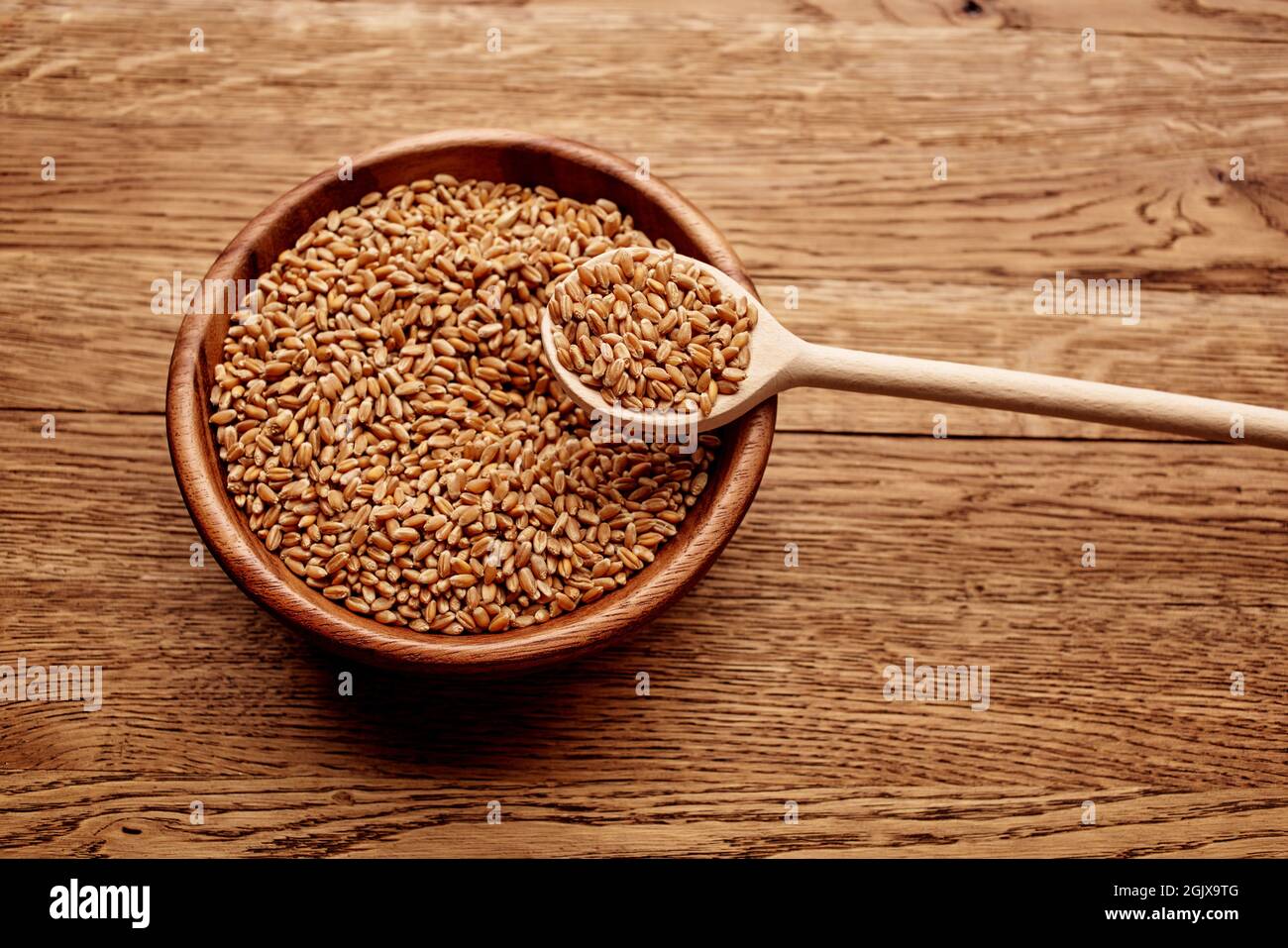 plate with grain organics wooden table kitchen ingredients healthy food ...