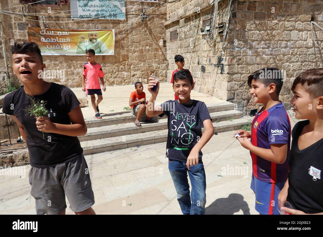 Children play in a square in Saida, Lebanon, on September, 11, 2021 ...