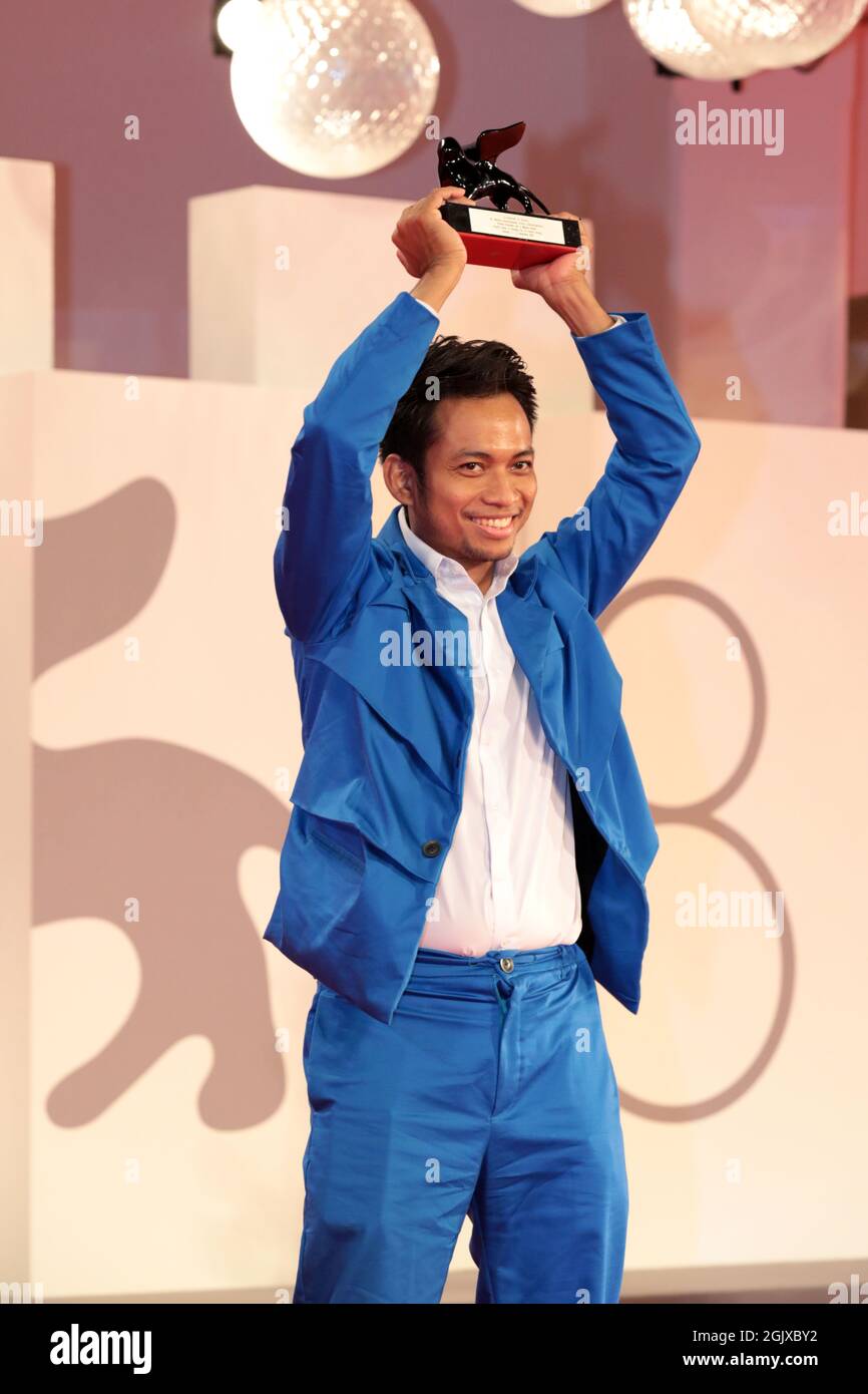 Venice, Italy. 11th Sep, 2021. Director Neang Kavich poses, on behalf ...