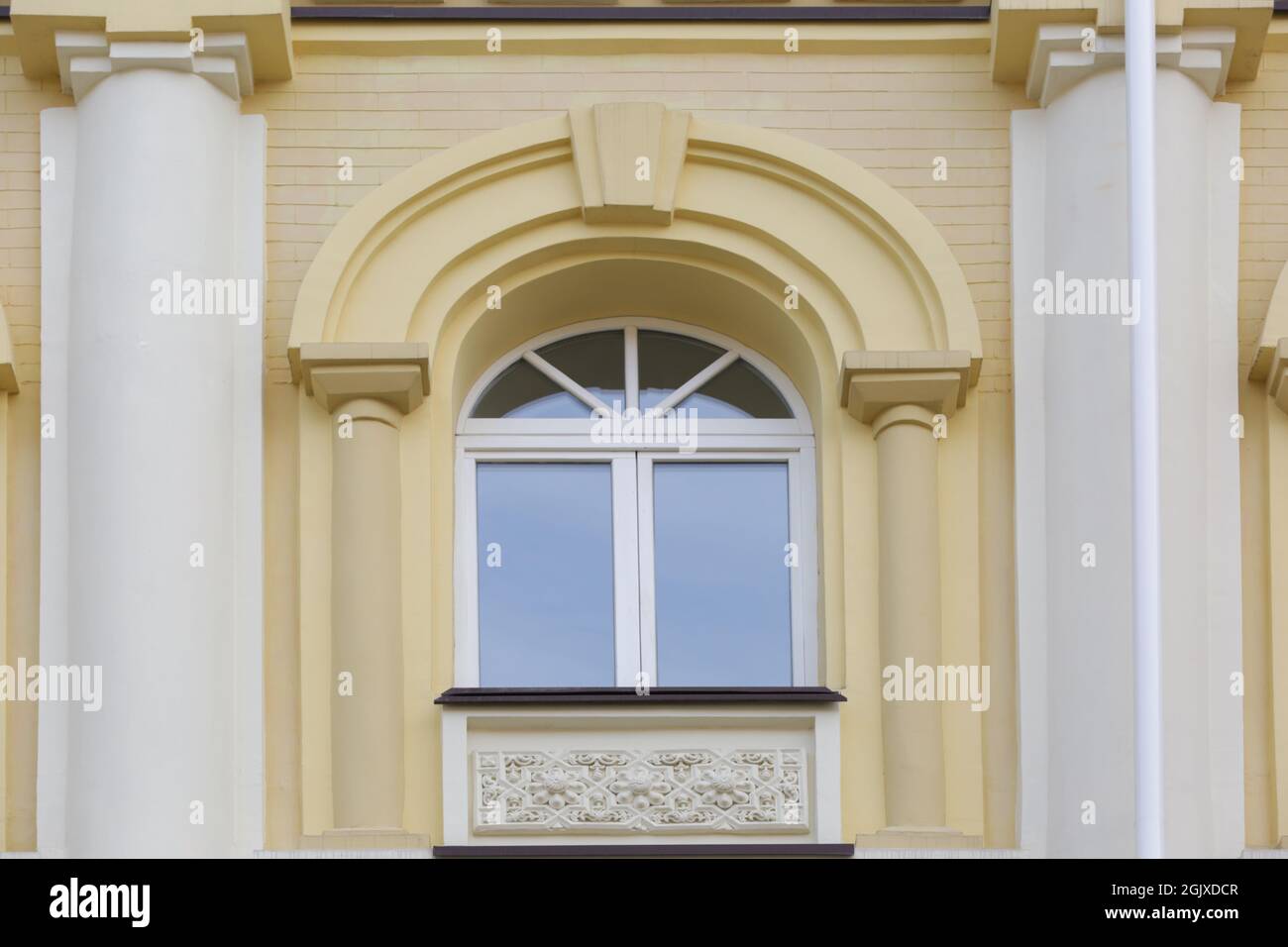 Arched window with decorated wall background Stock Photo - Alamy