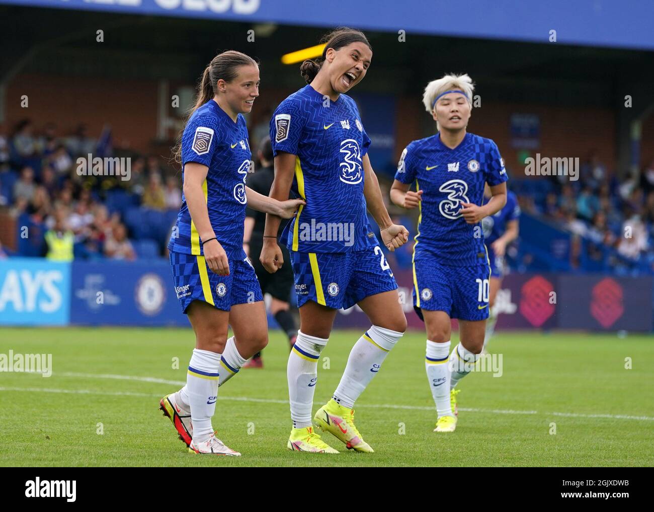 Chelsea's Sam Kerr (centre) celebrates scoring their side's third goal ...