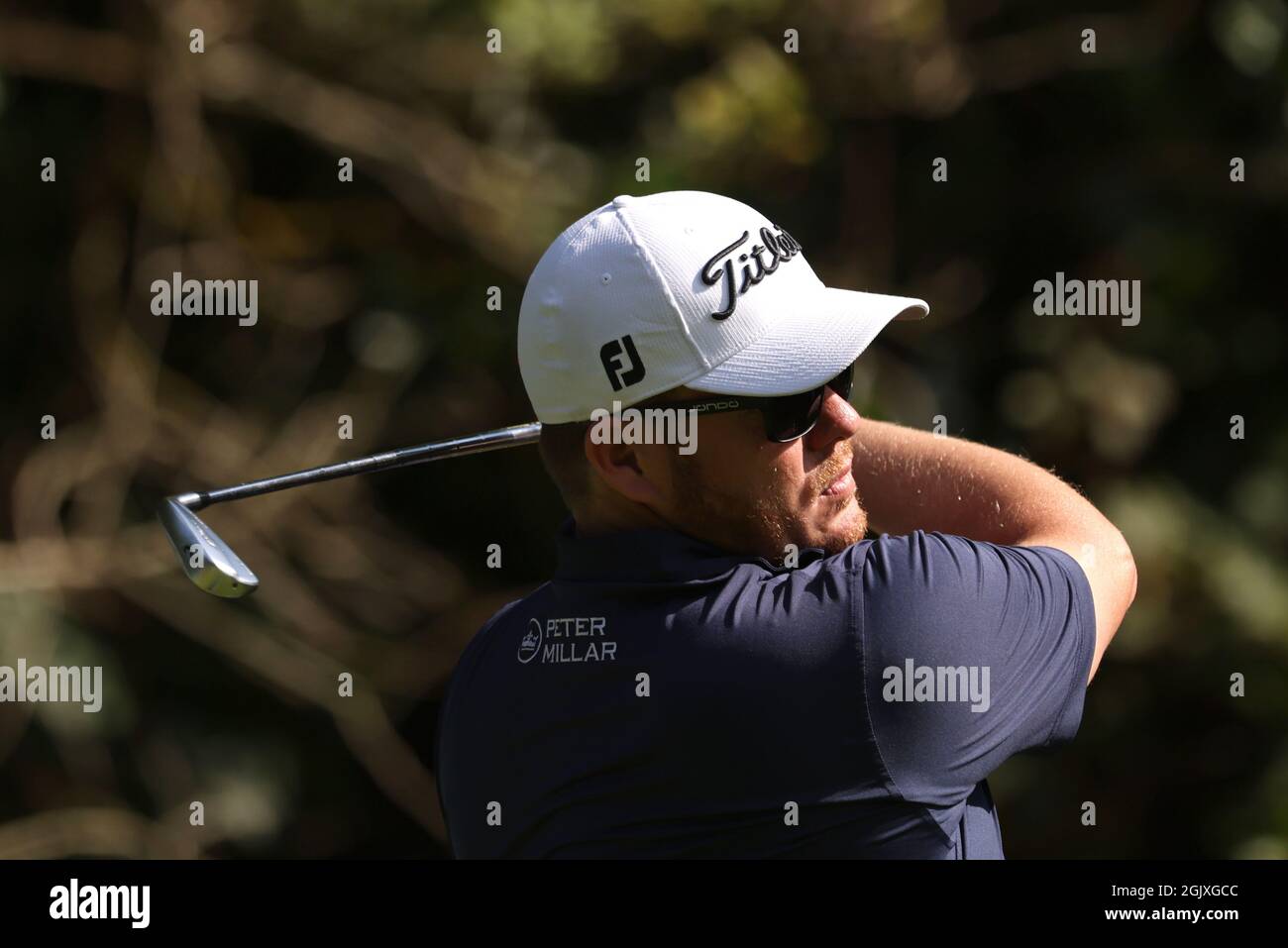George Coetzee tees off on the 7th during day four of the BMW PGA ...