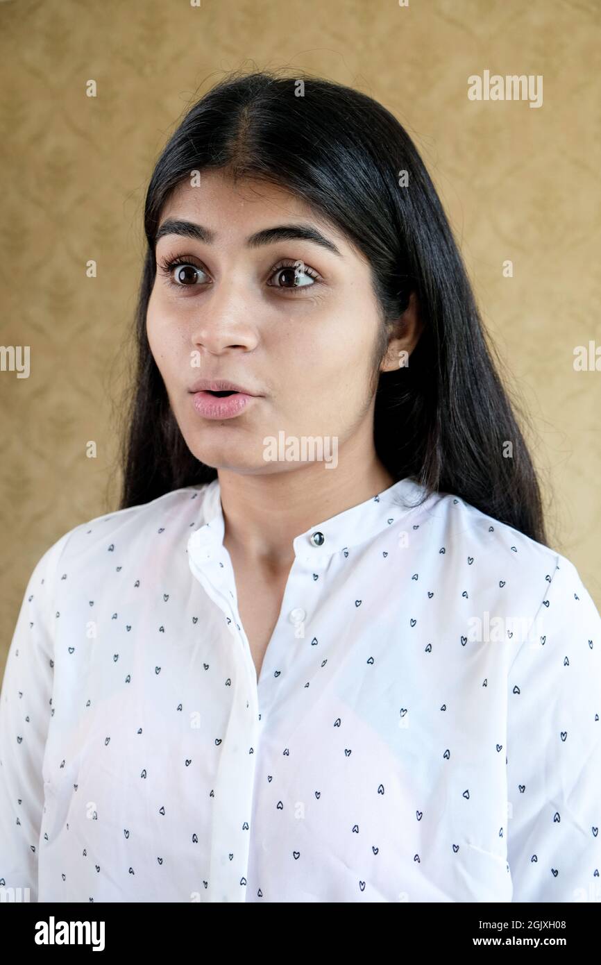 An Indian lady with an angry face expression Stock Photo - Alamy