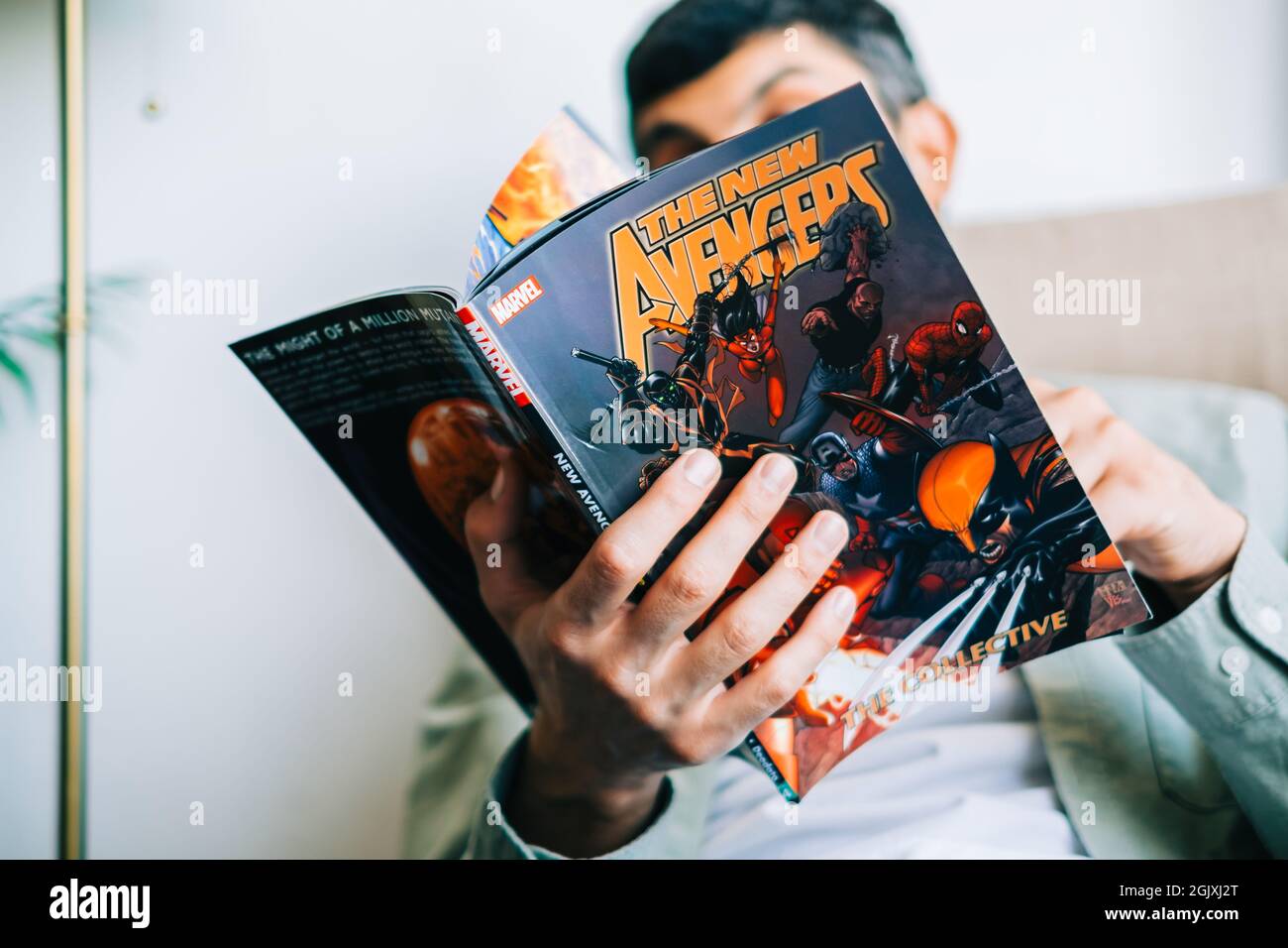 Superman reads book hi-res stock photography and images - Alamy