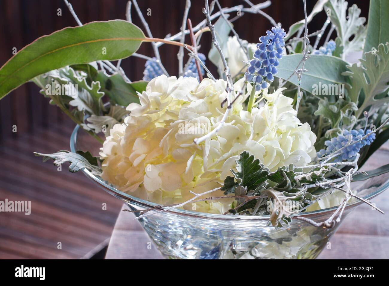 Wedding floral arrangement with hortensia and muscari flowers. Party ...