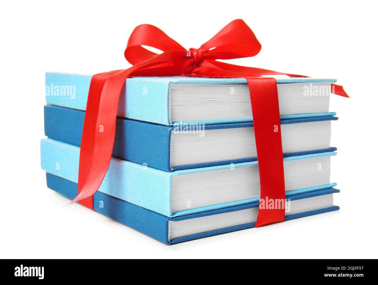 Stack of books with ribbon as gift on white background Stock Photo - Alamy