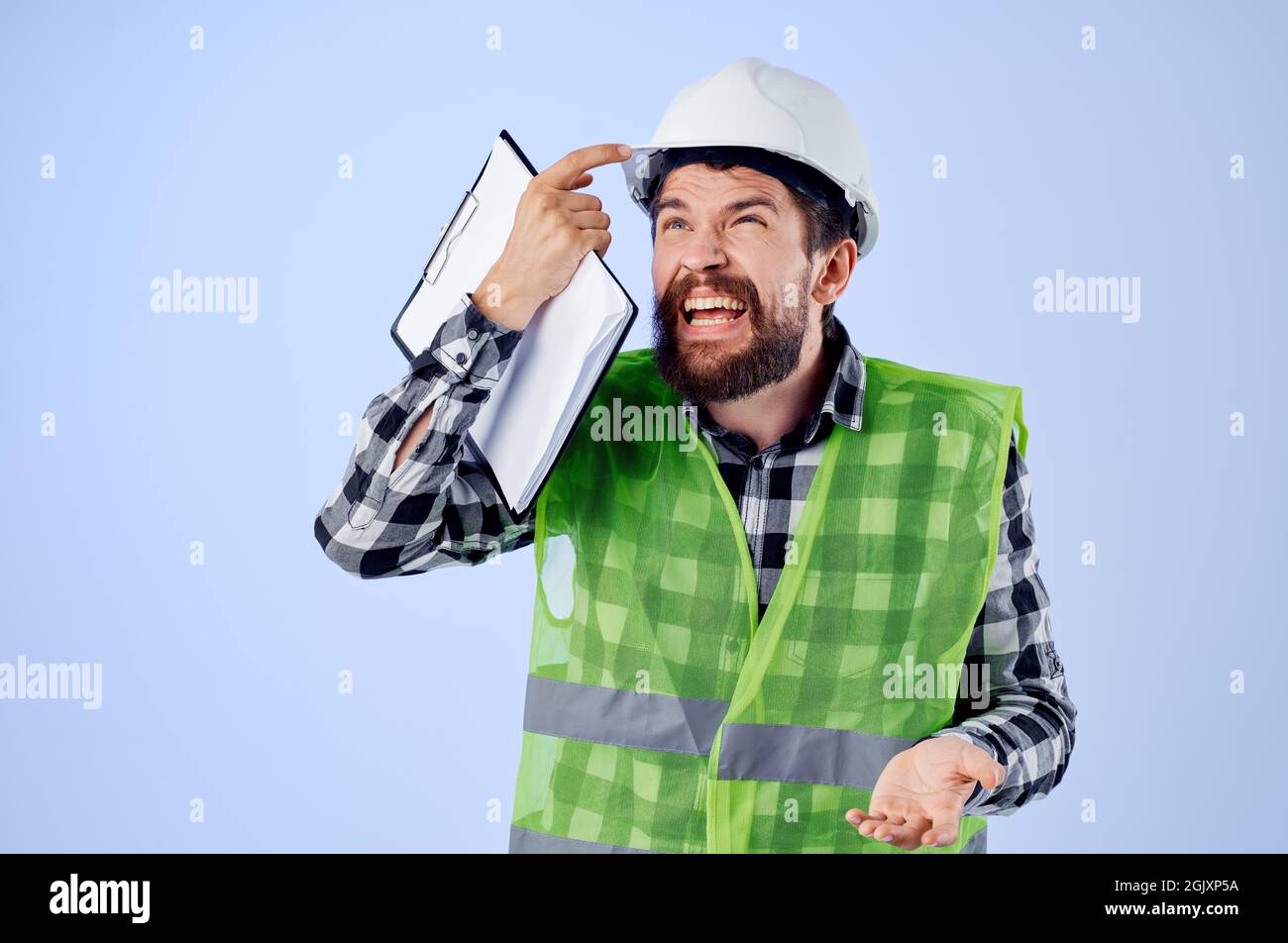 engineer with documents and drawings blueprints isolated background ...