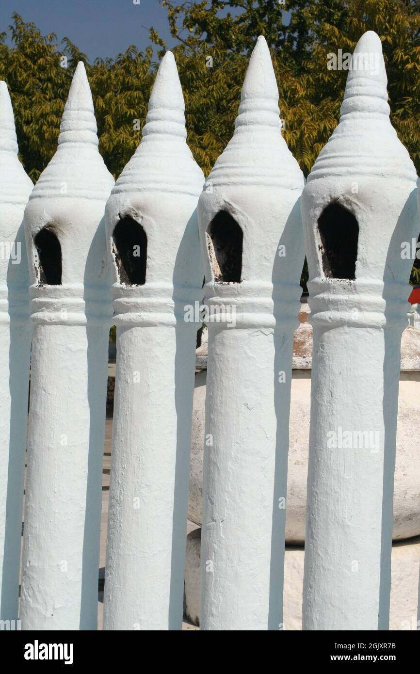 A close-up shot of white marble decorative fences with holes Stock ...
