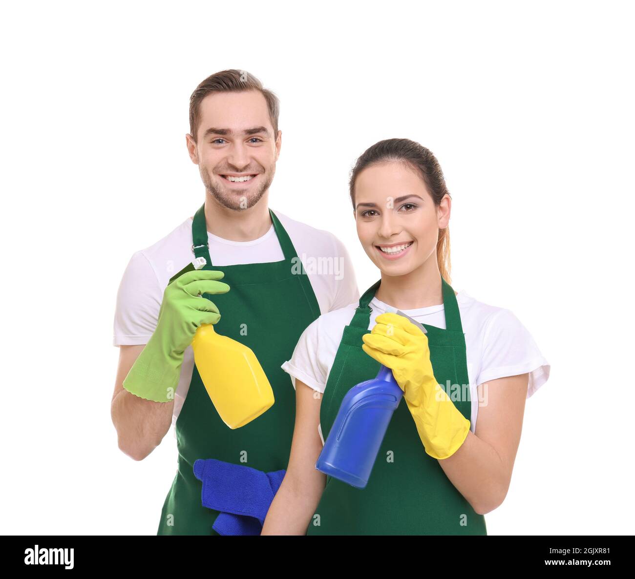Cleaning service team in green aprons on white background Stock Photo ...