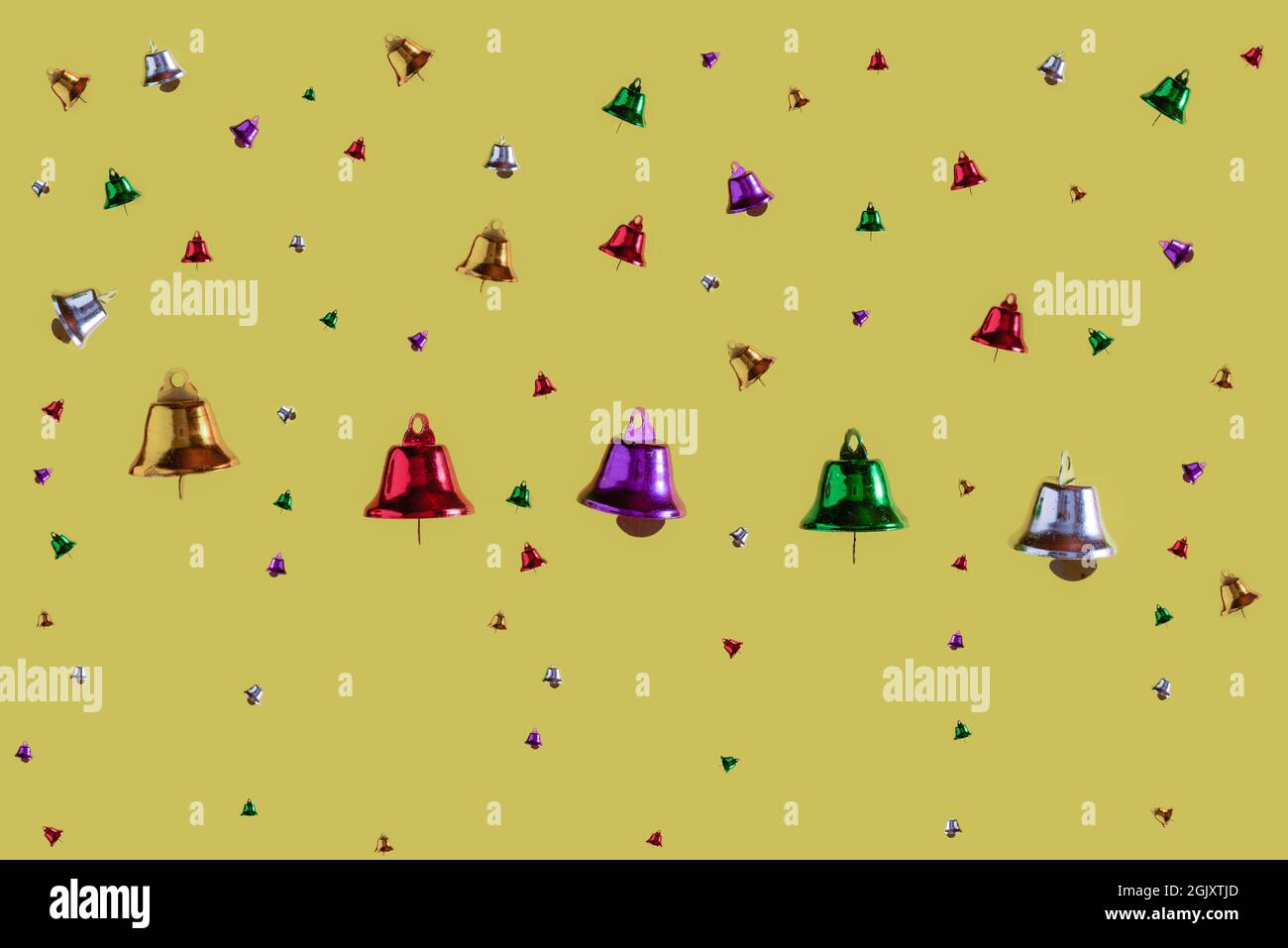 Decorative multicolored bells. Isolated on a yellow background Stock ...