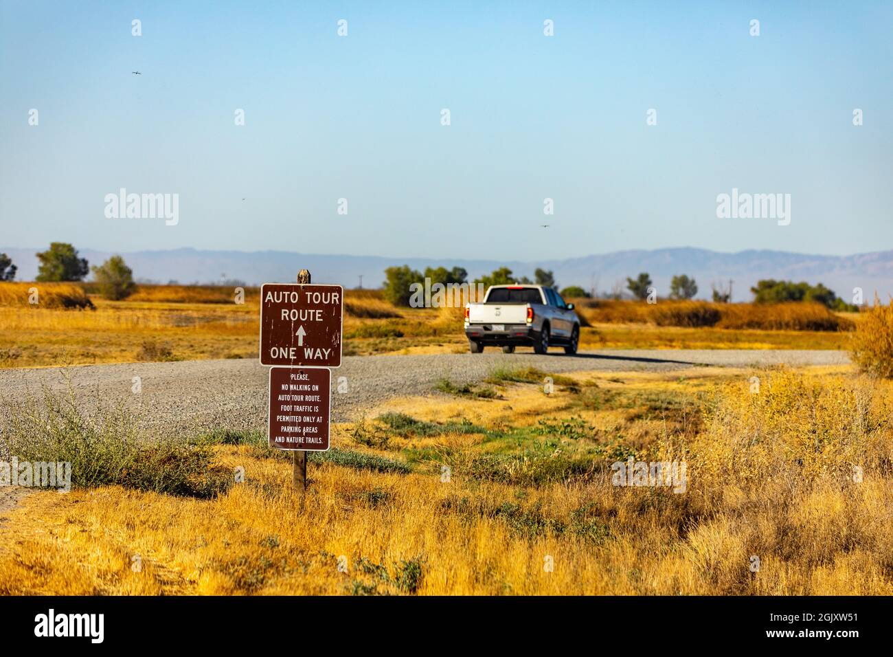 A sign marking the Auto tour route at the Merced National Wildlife ...