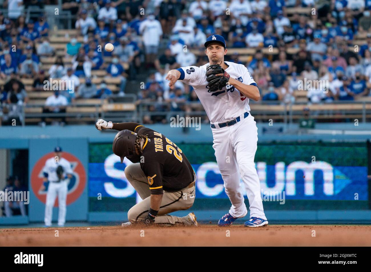 Los Angeles Dodgers shortstop Corey Seager (5) throws to first base to ...