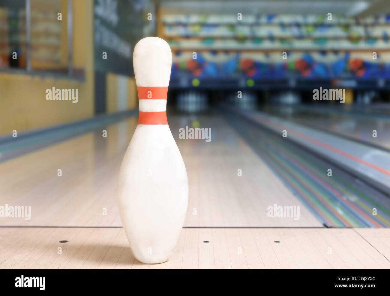 Pin on floor in bowling club Stock Photo - Alamy