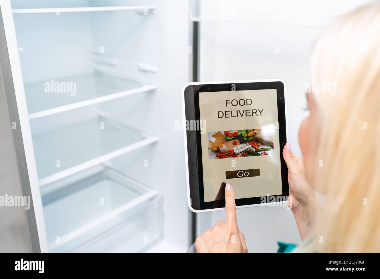 Conception of smart kitchen controlled by tablet application Stock ...