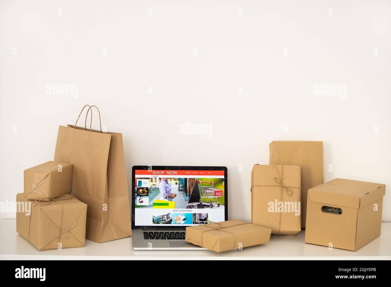 laptop computer with postal parcel, Selling online ideas concept Stock ...