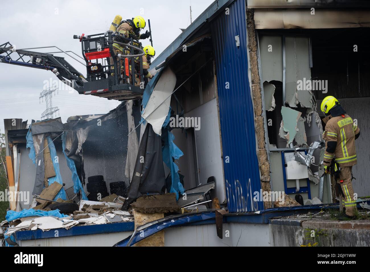 Berlin, Germany. 12th Sep, 2021. Firefighters extinguish an old ...