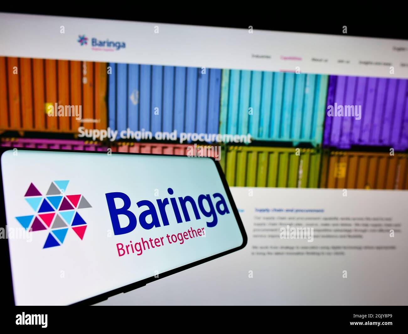 Cellphone with logo of British consulting company Baringa Partners LLP ...