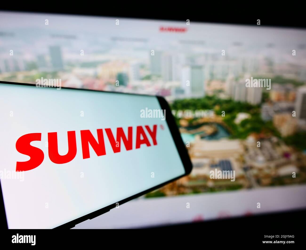 Mobile phone with logo of Malaysian conglomerate Sunway Berhad on ...