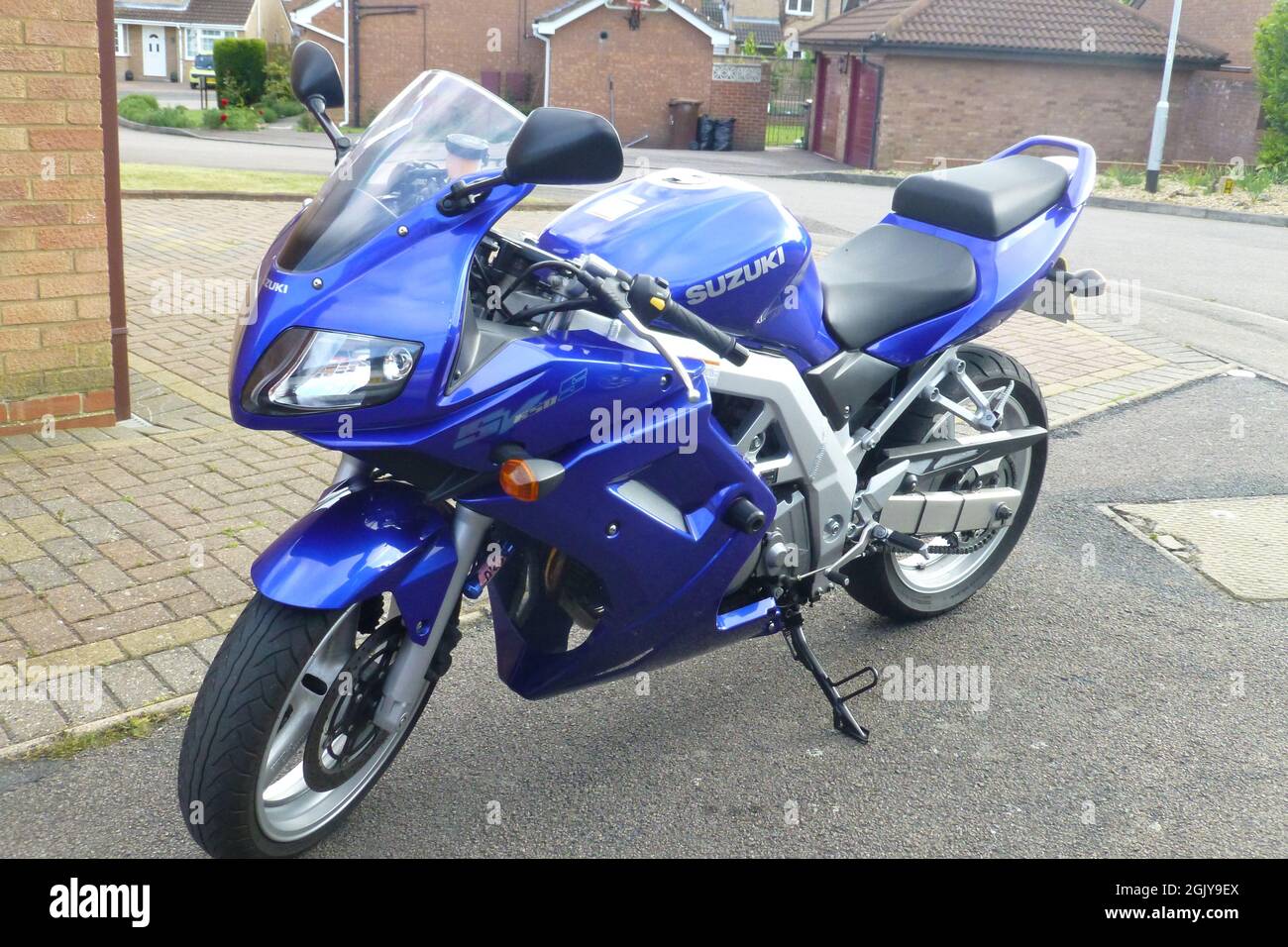 Blue Suzuki Motor bike Northampton UK Stock Photo - Alamy