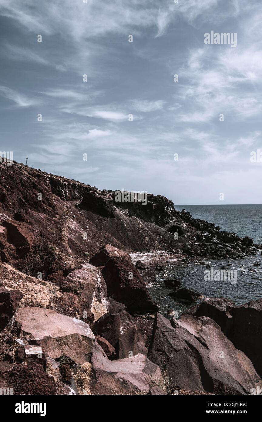 Scenic landscape of red sand beach near Akrotiri village on Santorini ...