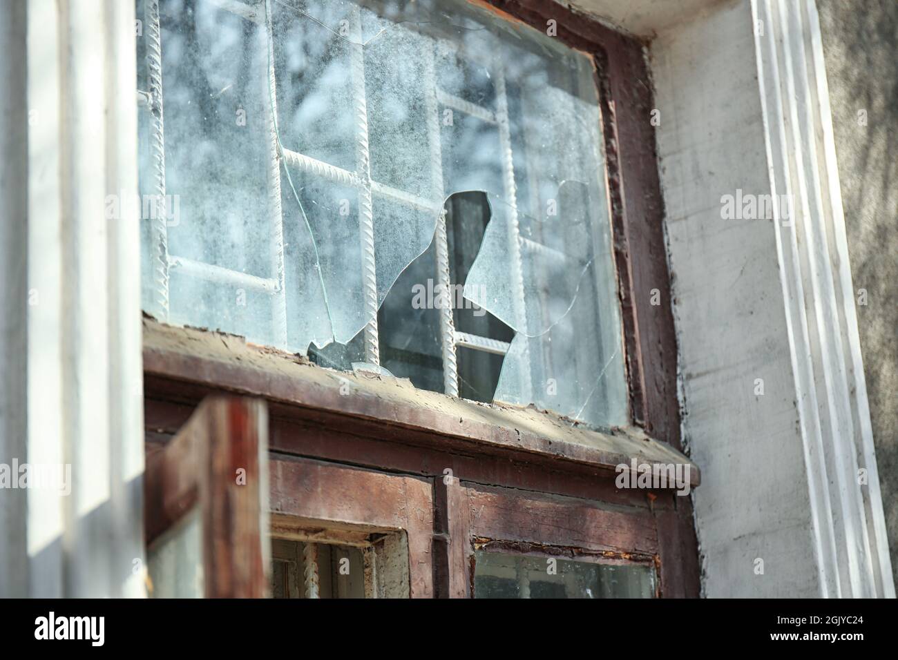 Old vintage window with broken glass Stock Photo - Alamy