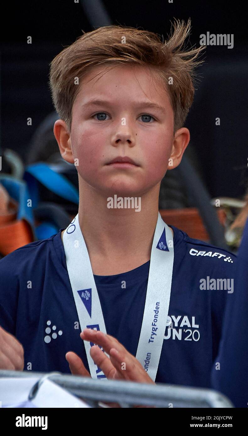 Prince Vincent cheering participants at the finish line in Royal Run in ...