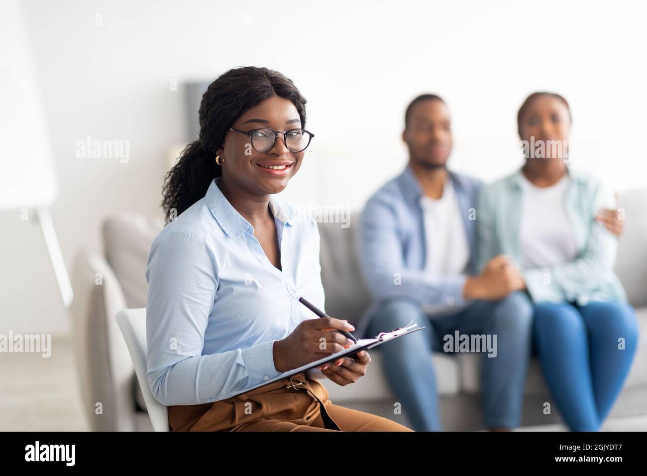 Portrait of black female marital counselor at office after effective ...