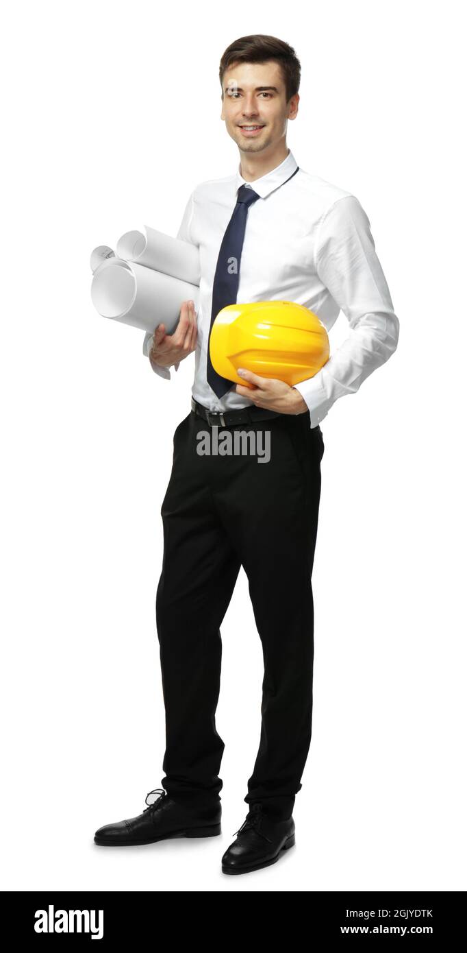 Young engineer holding hard hat and blueprints on white background ...