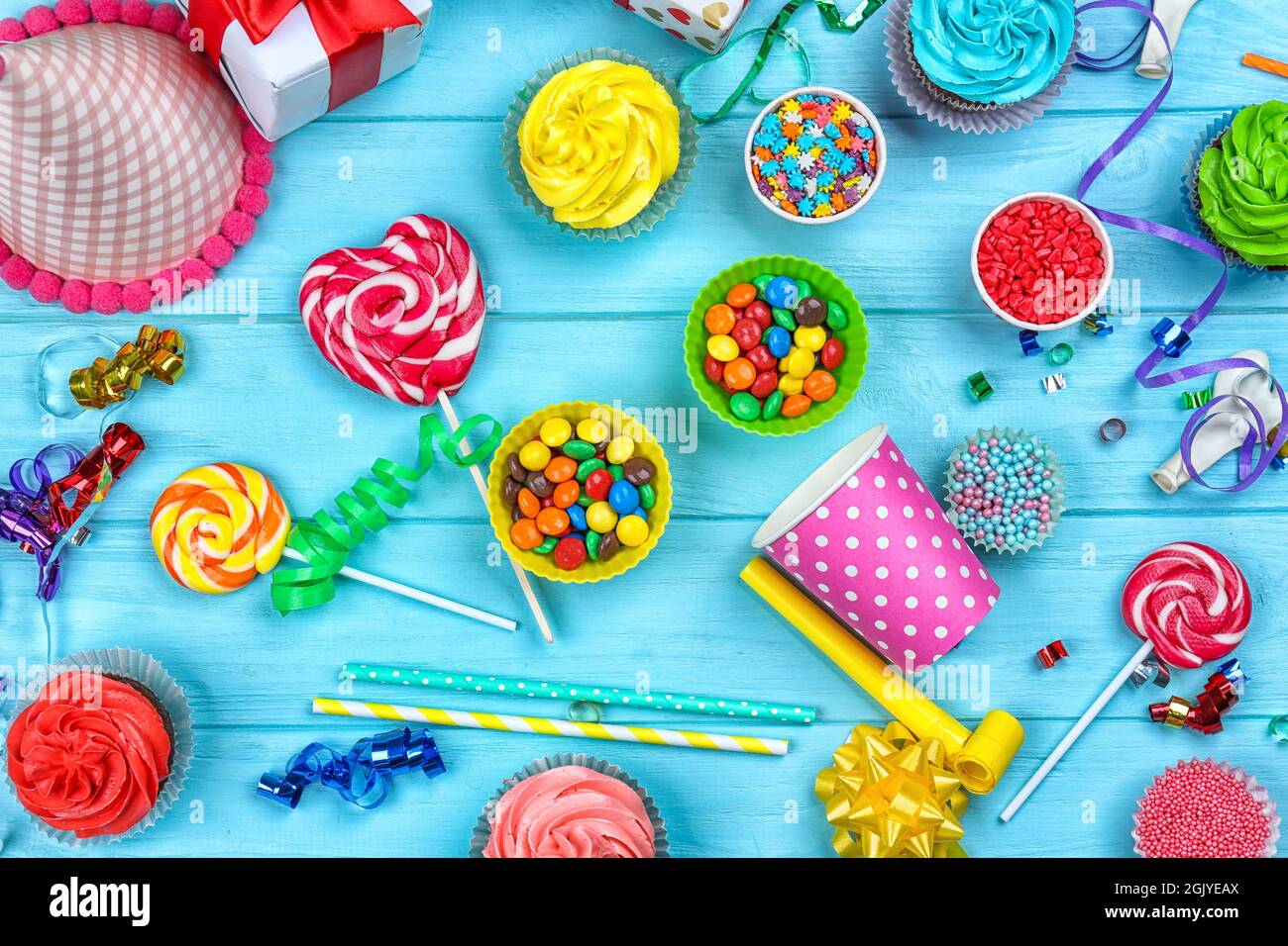 Bright birthday background with sweets and decorations Stock Photo - Alamy