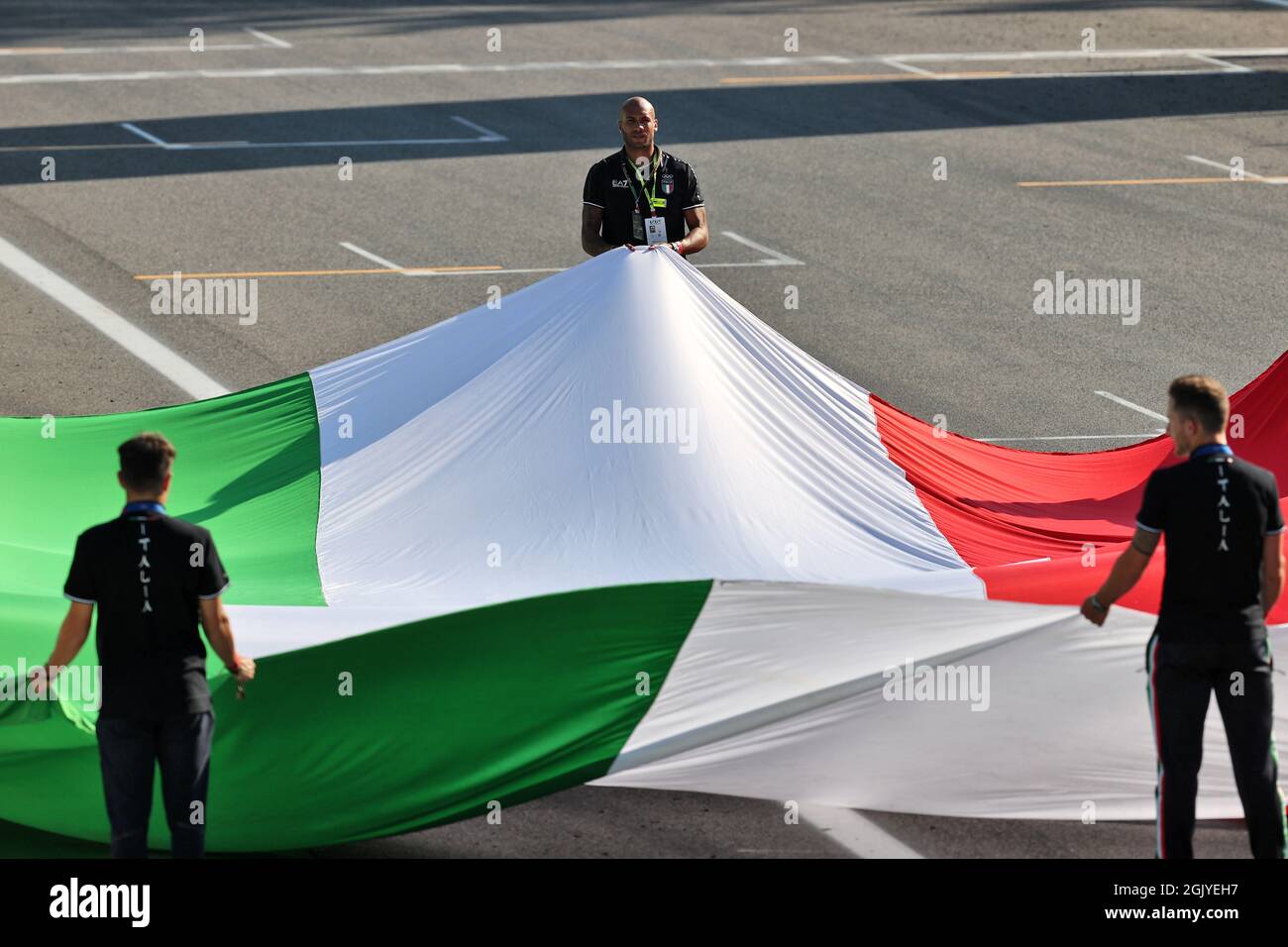 Circuit atmosphere - Large Italian flag held by Lamont Marcell Jacobs ...