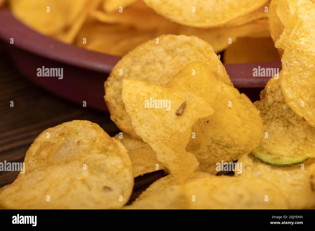 Potato chips scattered on the table, close-up, selective focus Stock ...