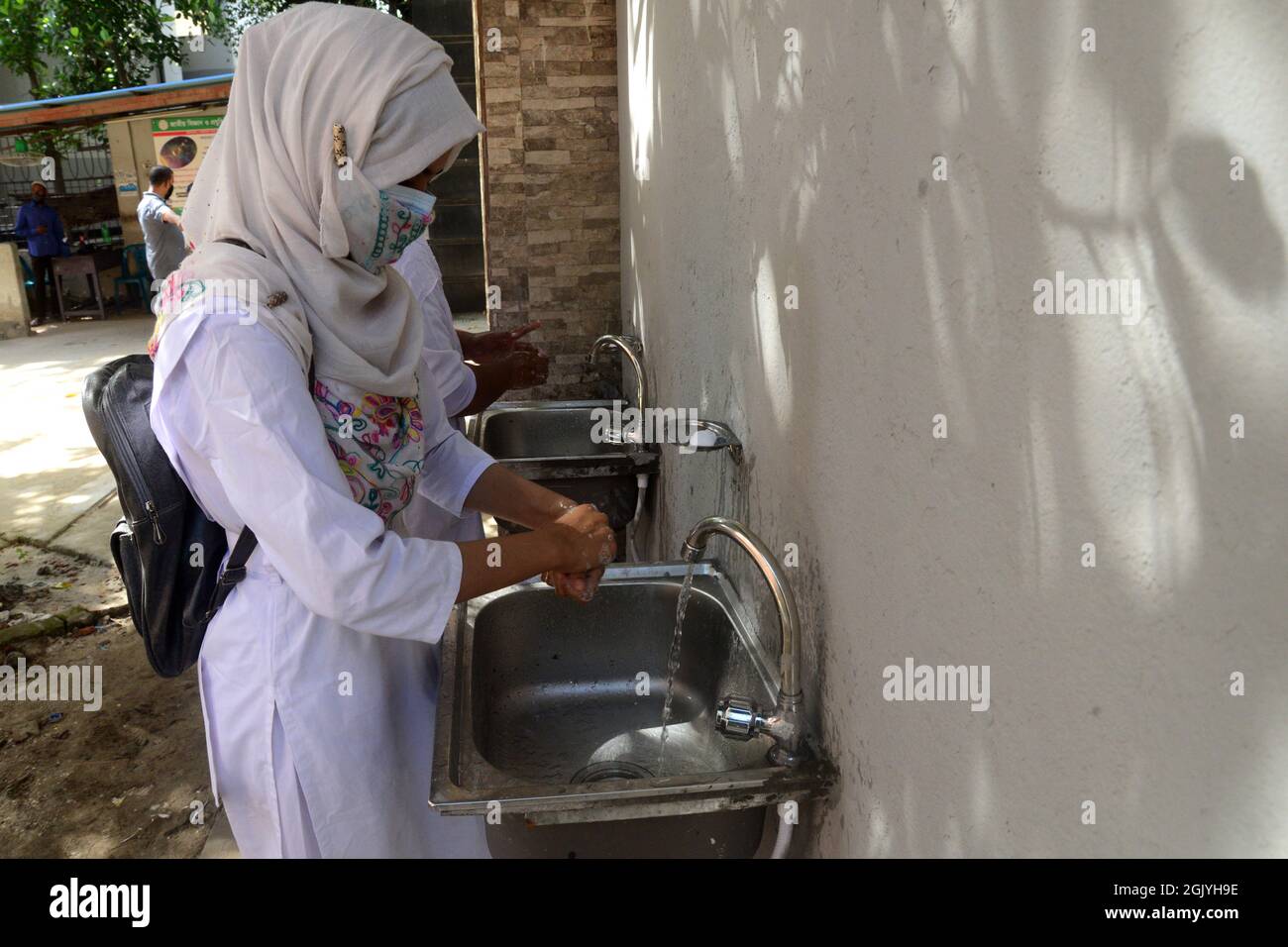 Dhaka, Bangladesh. September 12, 2021. Students washing their hand ...