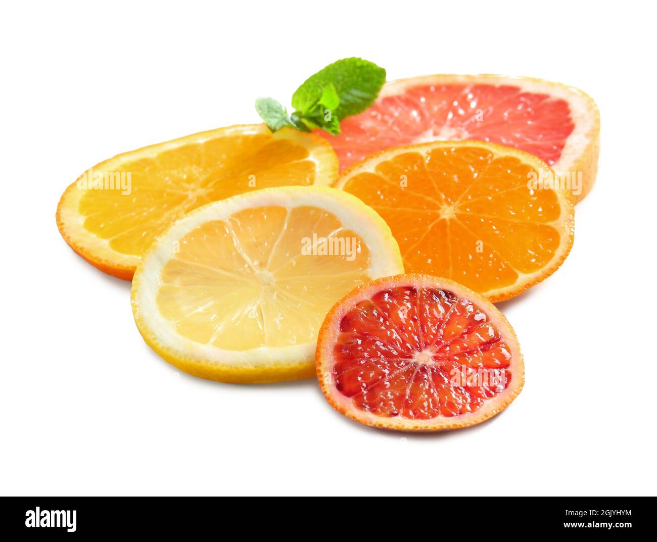 Citrus slices on white background Stock Photo - Alamy