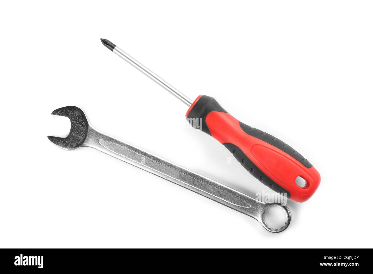 Combination wrench and screwdriver on white background Stock Photo - Alamy