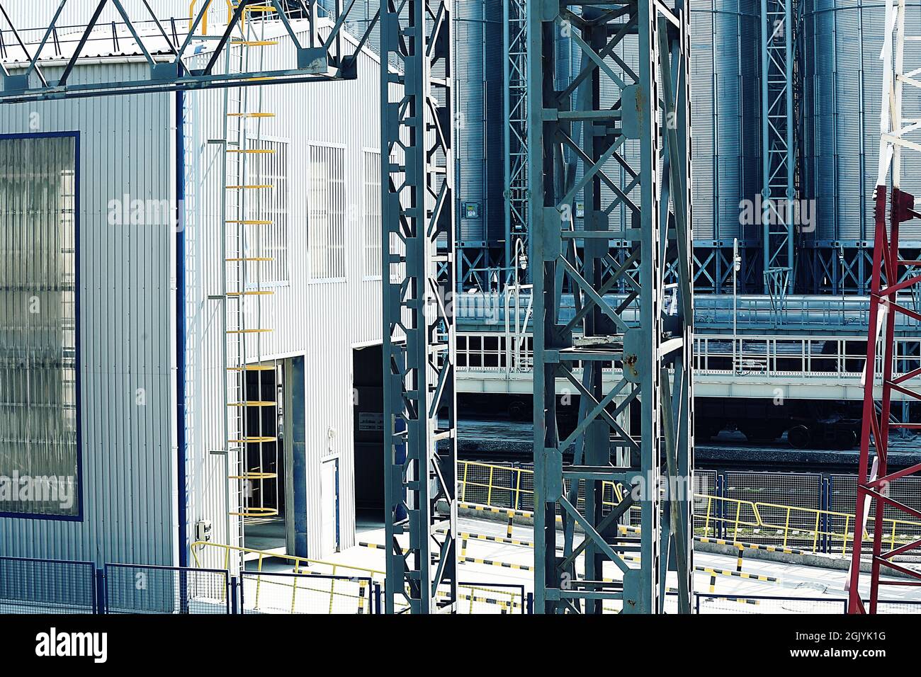 View of factory in sea port Stock Photo - Alamy