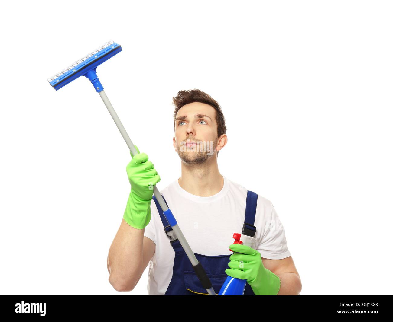 Young window cleaner on white background Stock Photo - Alamy