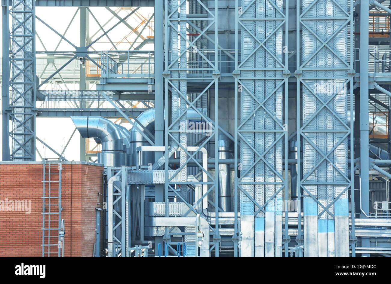 View of factory in sea port Stock Photo - Alamy