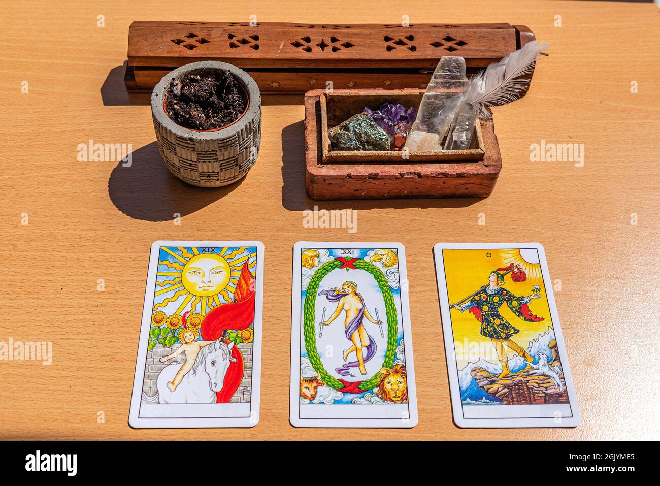 Fortune telling with tarot cards and giving information about the ...
