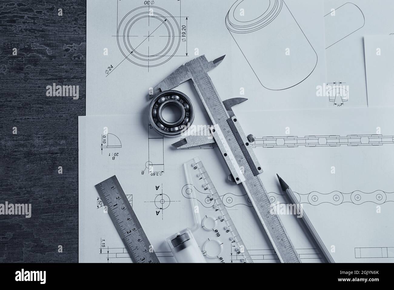 Engineering supplies and blueprints on workplace Stock Photo - Alamy