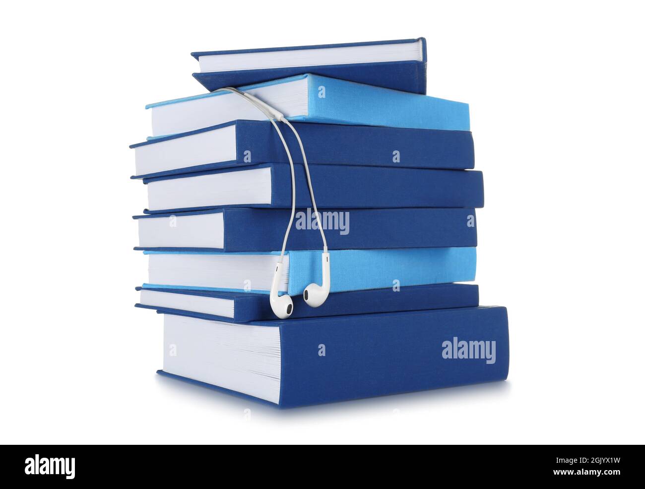Audiobook concept. Stack of books and earphones on white background ...