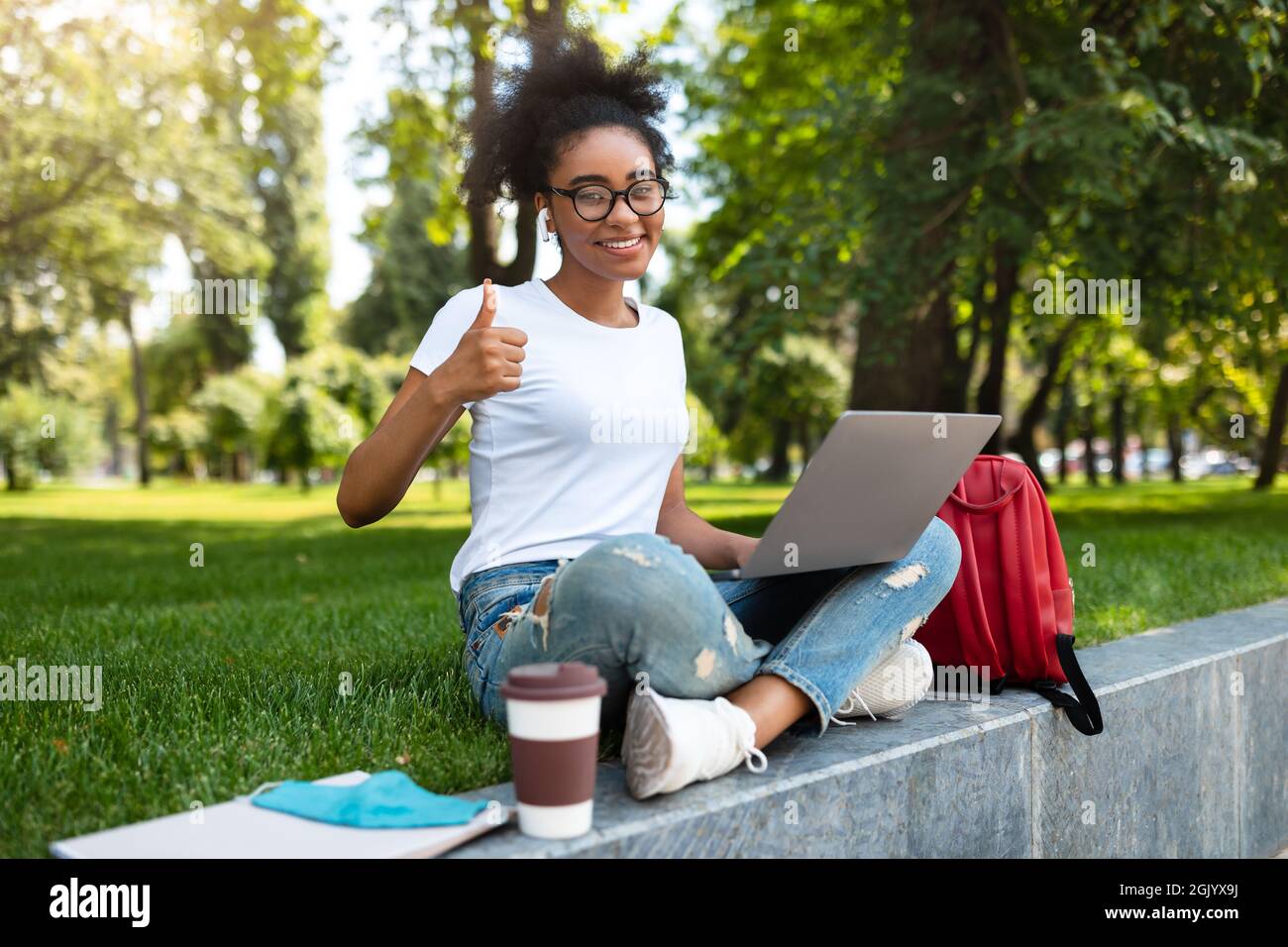 African teen girl laptop hi-res stock photography and images - Alamy